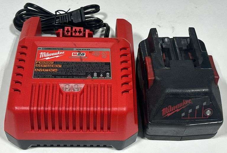 (X) Milwaukee M28 28V Lithium-Ion XC Extended Battery & Charger - Kraft Auction Service, LLC
