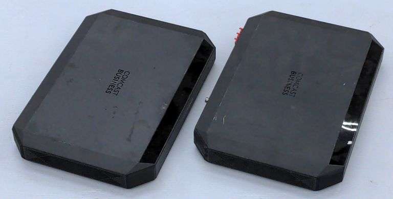 (E) (2) Comcast Business CBR-T Routers - Kraft Auction Service, LLC