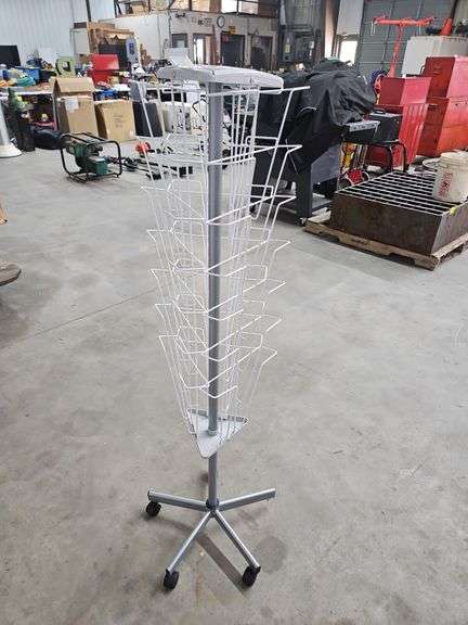 (AM) Rotating Floor Spinner Display Stand. - Kraft Auction Service, LLC