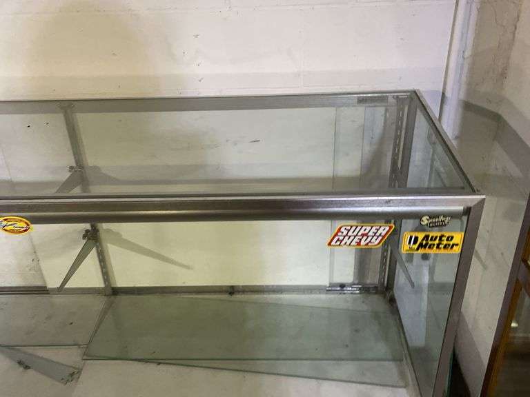 (A) Heavy Showcase 70” x 20” x 38” - Kraft Auction Service, LLC