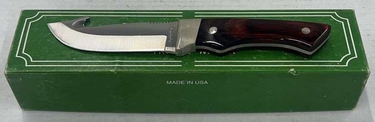 (A) Remington Conquest Gut Hook Knife. - Kraft Auction Service, LLC