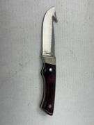 (A) Remington Conquest Gut Hook Knife. - Kraft Auction Service, LLC