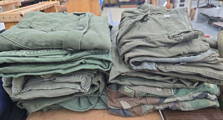 lot of Military Jackets, Shirts & Pants (3 stacks) - Kramer Auction LLC