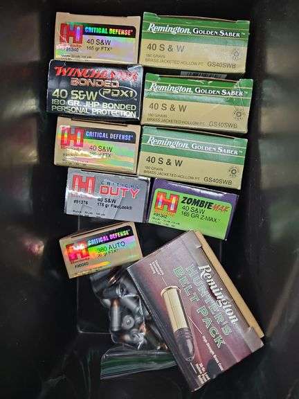 2 cans of misc. Ammo, CO2 Tanks, etc - Kramer Auction LLC