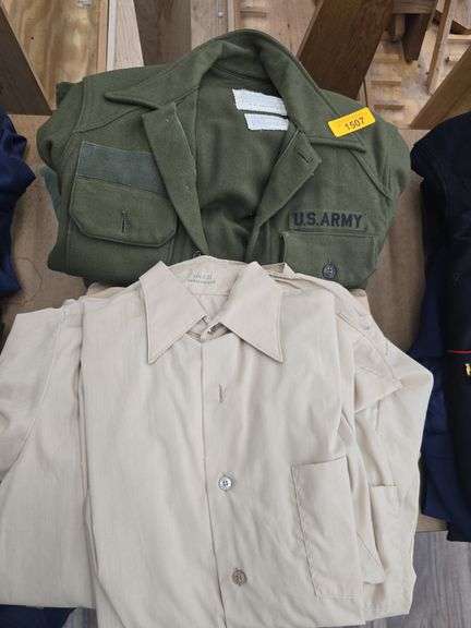 2 stacks of Military Uniforms - Kramer Auction LLC