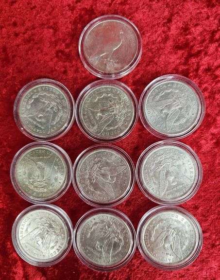 lot of 9 Morgan Silver Dollars - Kramer Auction LLC