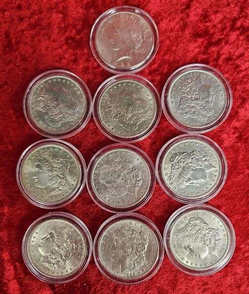 lot of 9 Morgan Silver Dollars - Kramer Auction LLC