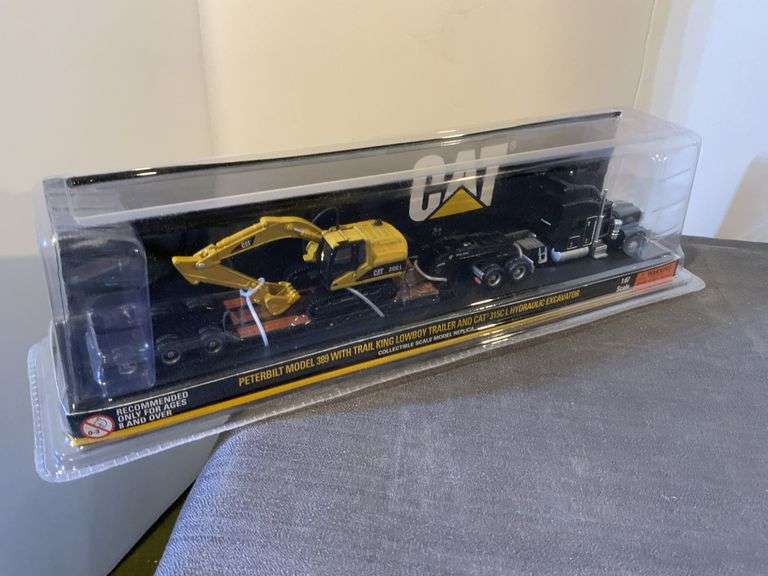 CATERPILLAR BOTTOM DUMP TRAILER & CAT CONSTRUCTION TRAILER & PETERBILT ...