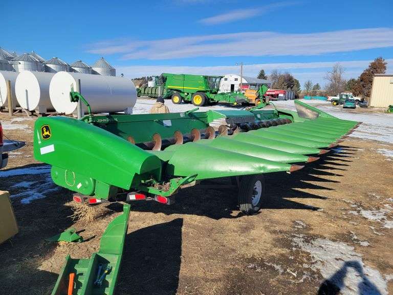 John Deere 1293 Corn Head W/ Trailer - Kraupie's Real Estate & Auctioneers