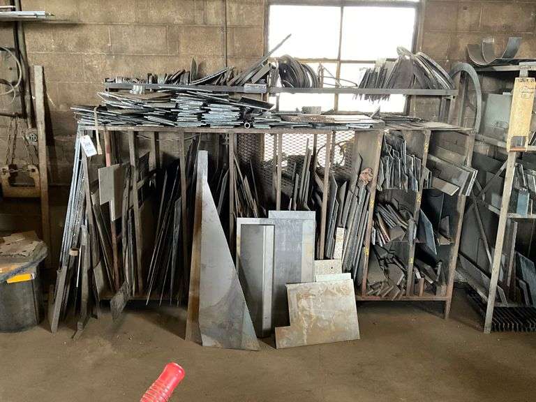 8' Rack with Scrap Metal Pieces - Kraupie's Real Estate & Auctioneers