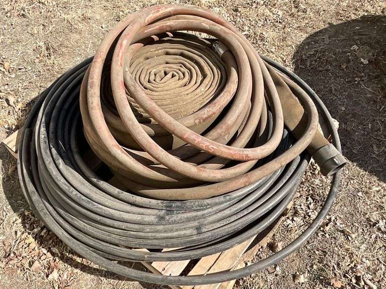 1" Black Poly Pipe Fire Hoses - Kraupie's Real Estate & Auctioneers