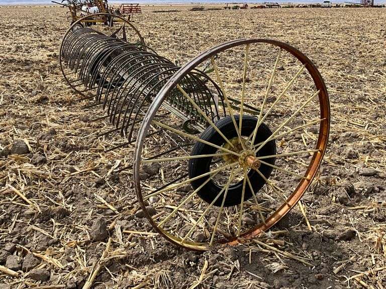 John Deere 12’ Dump Rake, Good - Kraupie's Real Estate & Auctioneers