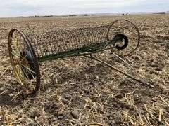 John Deere 12’ Dump Rake, Good - Kraupie's Real Estate & Auctioneers