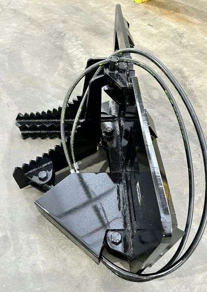 Skid Steer Tree Puller - Kraupie's Real Estate & Auctioneers