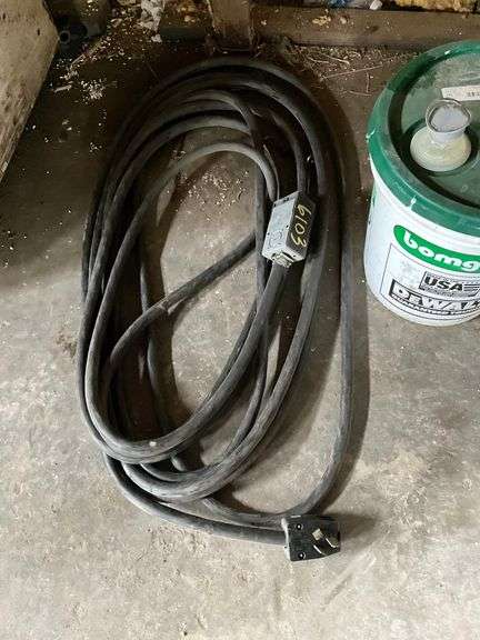 Big 220v drop cord - Kraupie's Real Estate & Auctioneers