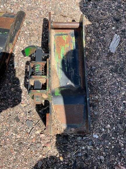 2 John Deere Loader Adapters - Kraupie's Real Estate & Auctioneers