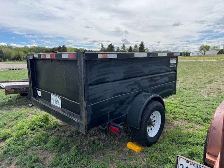 Paiute 2 Wheel Dump Trailer - Kraupie's Real Estate & Auctioneers