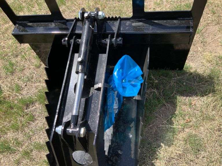 Skid Steer Spade Grapple - Kraupie's Real Estate & Auctioneers