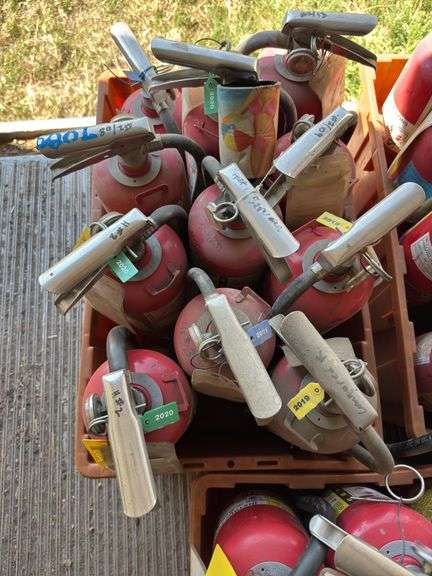 11 Various size fire extinguishers - Kraupie's Real Estate & Auctioneers