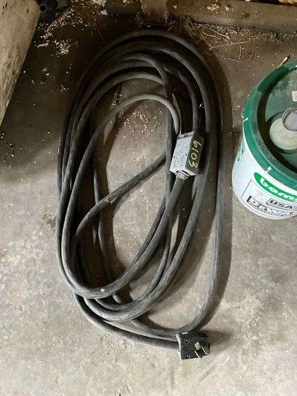 Big 220v drop cord - Kraupie's Real Estate & Auctioneers