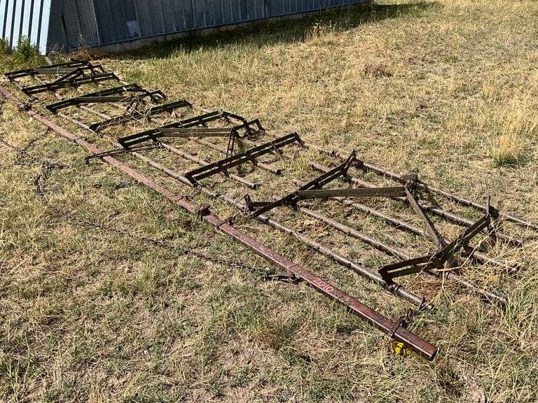 24', 4 Section Spike Tooth Harrow - Kraupie's Real Estate & Auctioneers