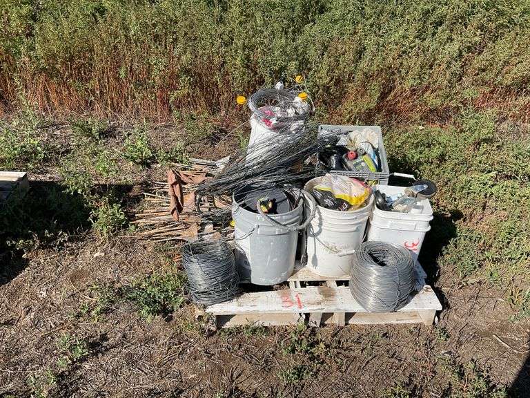 Pallet of Fencing Supplies, Fencers, Pencil Posts & Wire - Kraupie's ...