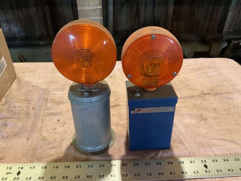 Flashing battery lights - Legacy Auction Company