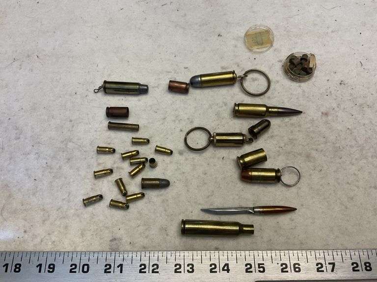 Assorted bullet items and percussion caps - Legacy Auction Company