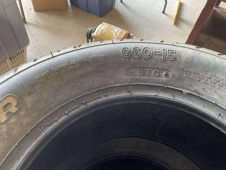 4 used stock car tires G60-15 - Legacy Auction Company