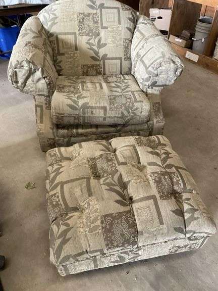 Overstuffed chair and ottoman - Legacy Auction Company