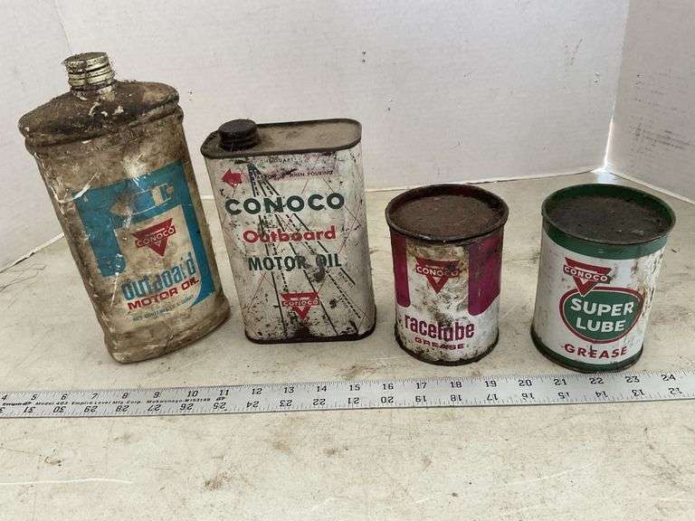 Vintage Conoco cans, gas pedal - Legacy Auction Company