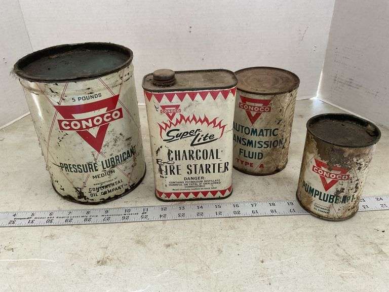 Vintage Conoco cans - Legacy Auction Company