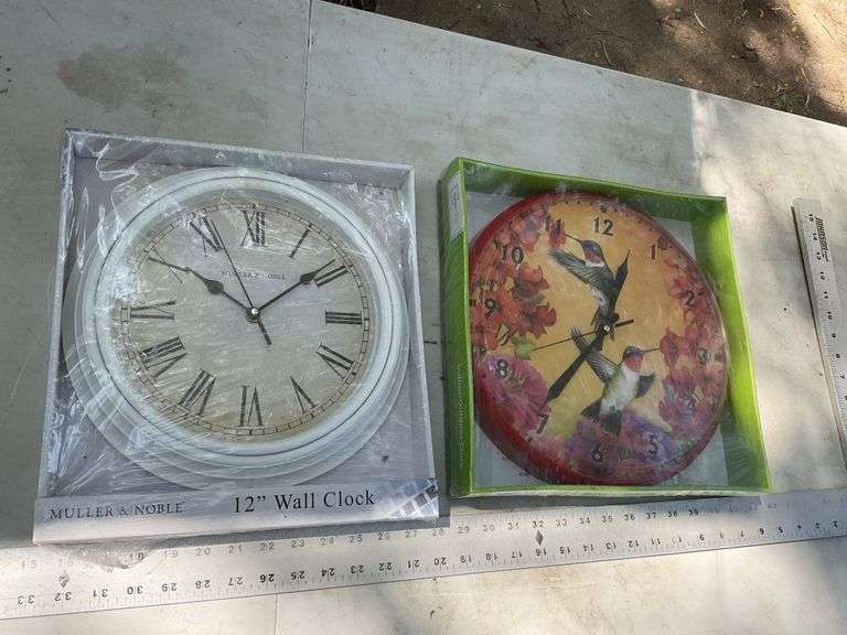 2- wall clocks - Legacy Auction Company
