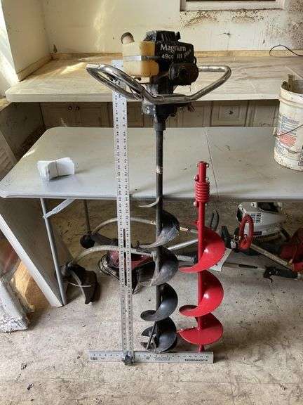 Gas powered 7 inch auger with extra 8 inch auger - Legacy Auction Company