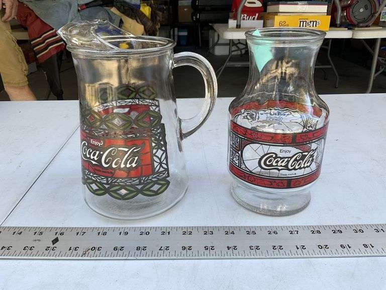 Coca-Cola/Godfather’s pizza pitchers . 1970s - Legacy Auction Company