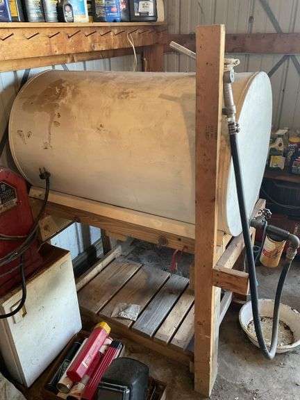 150 gallon gasoline fuel barrel on stand with 9" - Legacy Auction Company