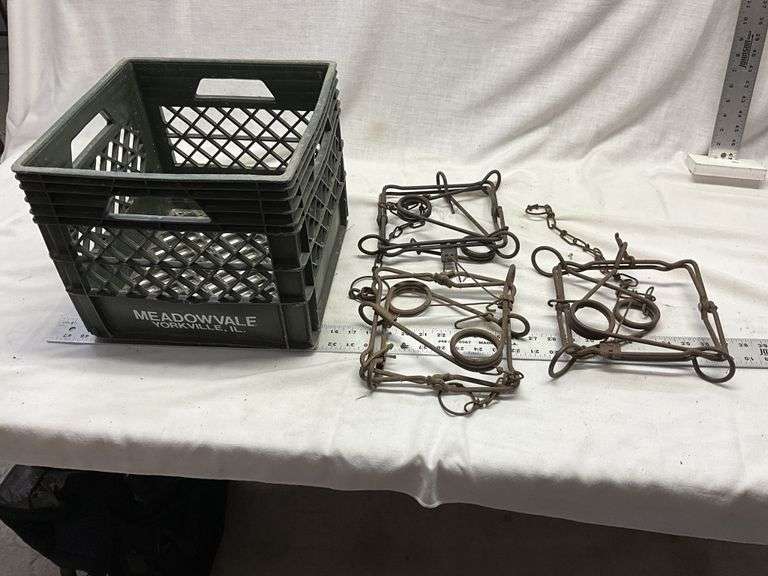 3 conibear traps with crate - Legacy Auction Company