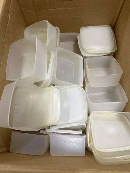 Box of Tupperware freezer boxes - Legacy Auction Company