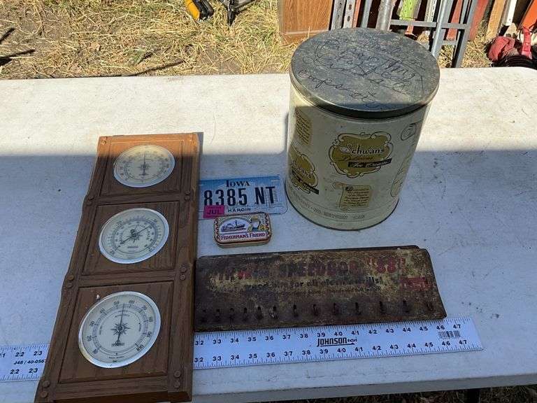 Schwan's tin, barometer, rusted display sign, - Legacy Auction Company