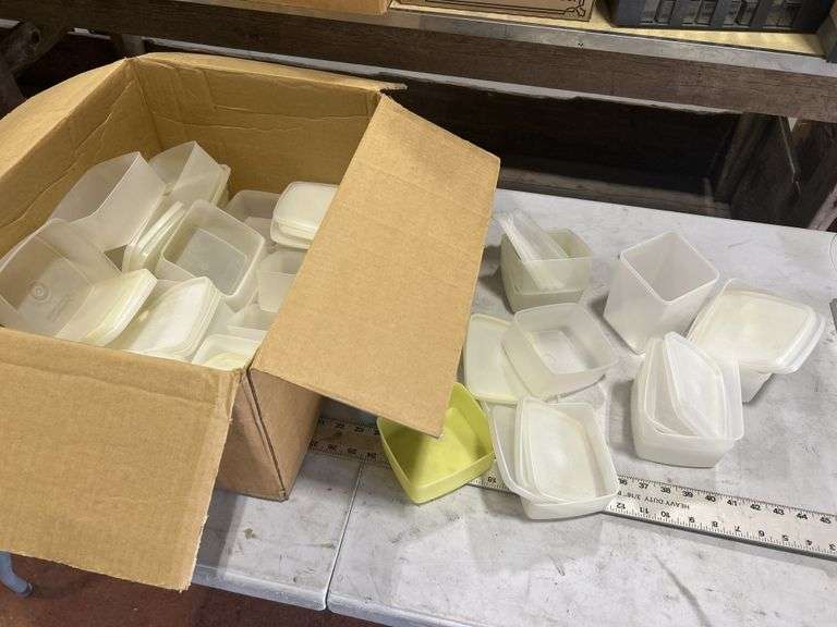 Box of Tupperware freezer boxes - Legacy Auction Company