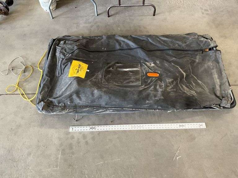 Sno-boat ice fishing hut/sled - Legacy Auction Company