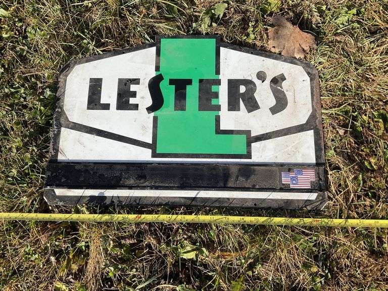 Metal Lester's sign - Legacy Auction Company