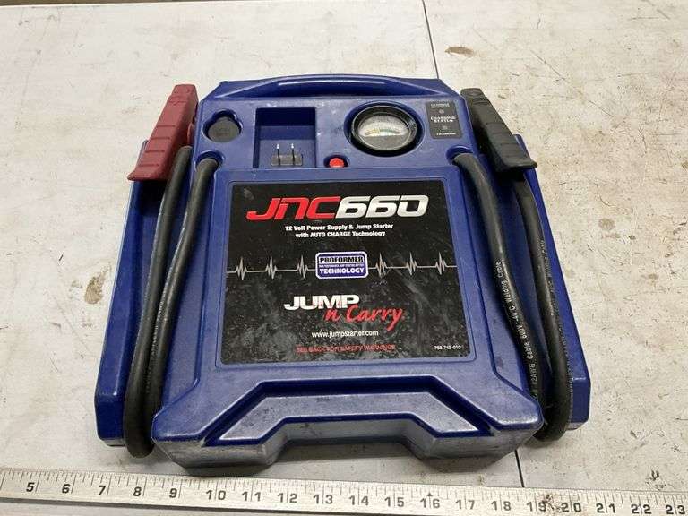JNC660 12 V power supply and jump starter with - Legacy Auction Company