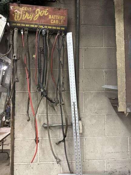 Crescent battery cable display and battery cables - Legacy Auction Company