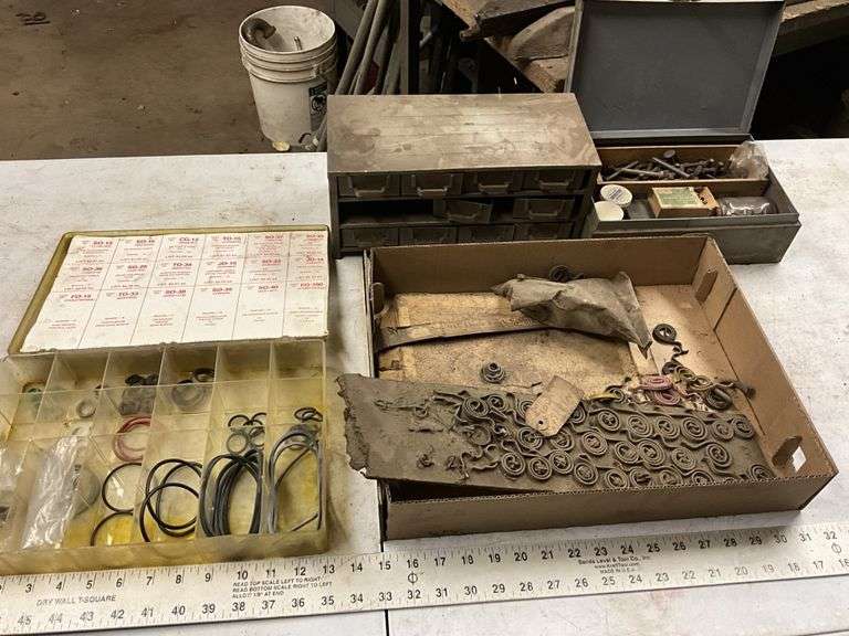 Assorted rivets, door lock, springs and O-rings, - Legacy Auction Company