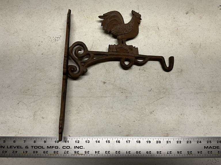 Cast iron rooster bracket - Legacy Auction Company