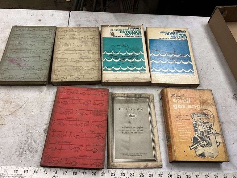 Car and outboard motor books - Legacy Auction Company