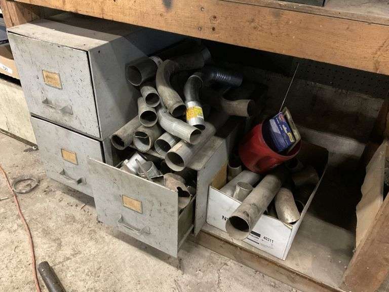Exhaust pipe and organizers - Legacy Auction Company