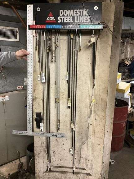 Brake line display with brake lines - Legacy Auction Company