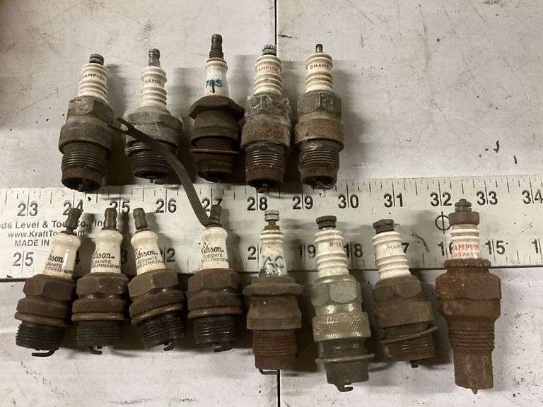 Edison, AC and champion vintage spark plugs - Legacy Auction Company